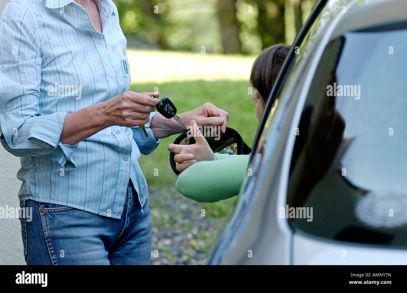 Young driver and his mother Stock Photo - Alamy
