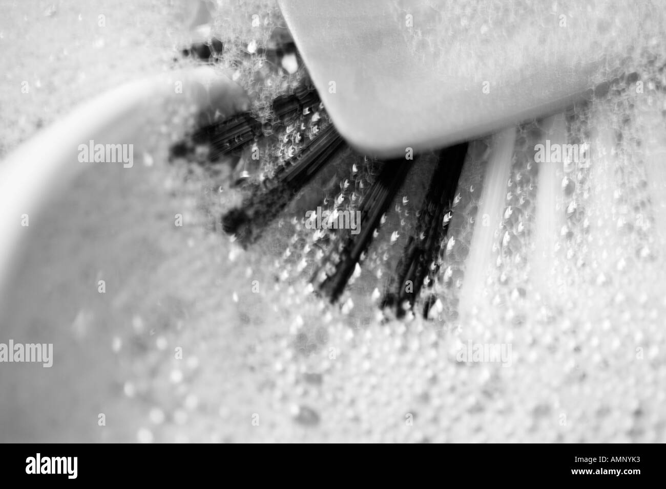 Cleaning dirty dishes Black and White Stock Photos & Images - Alamy