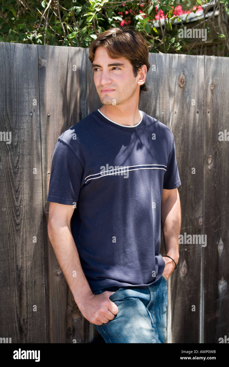 Male lean against fence hi-res stock photography and images - Alamy