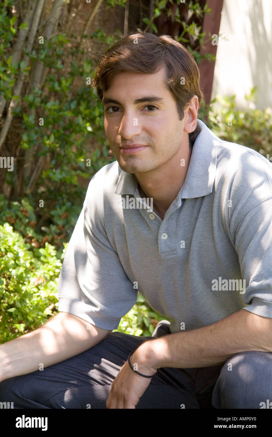 Portrait of young adult man outdoors Stock Photo - Alamy