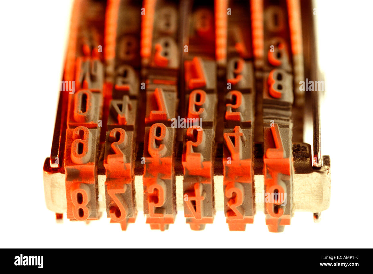 Numbering stamp in red light Stock Photo - Alamy