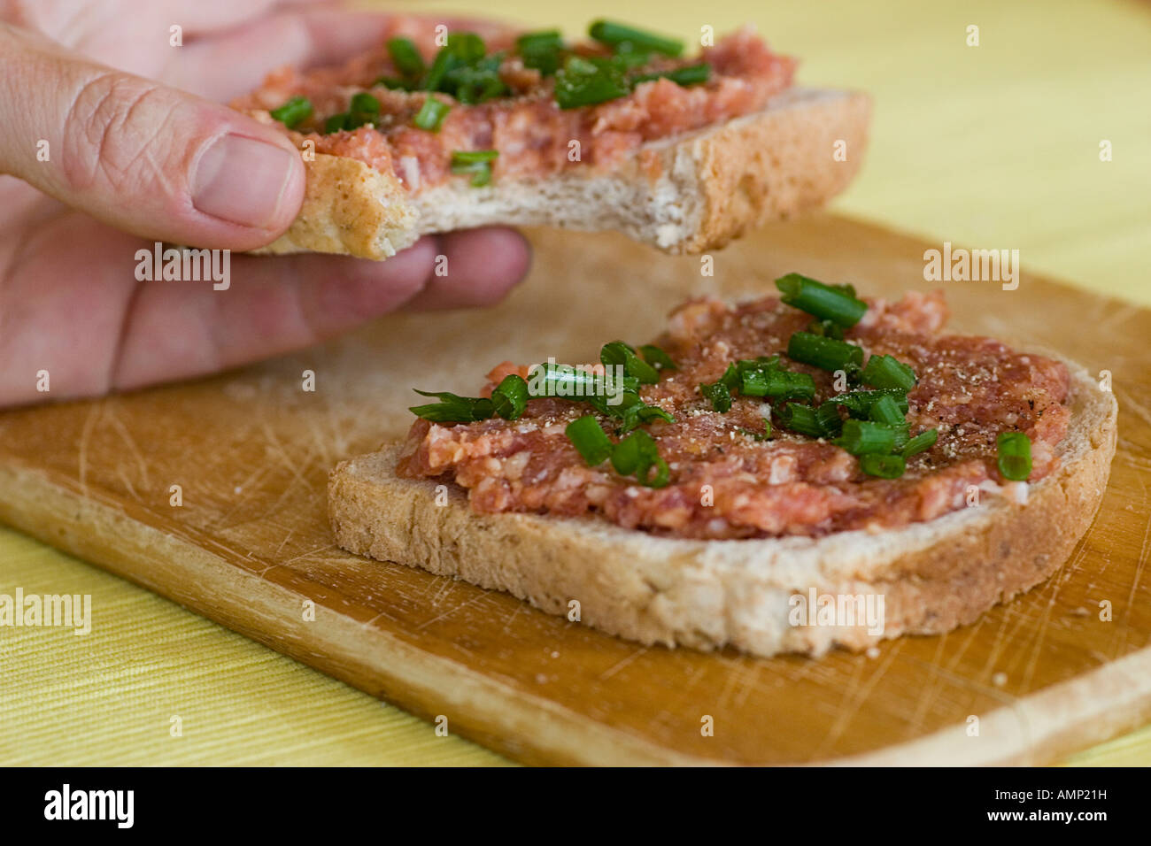 Toast in the hand Stock Photo - Alamy