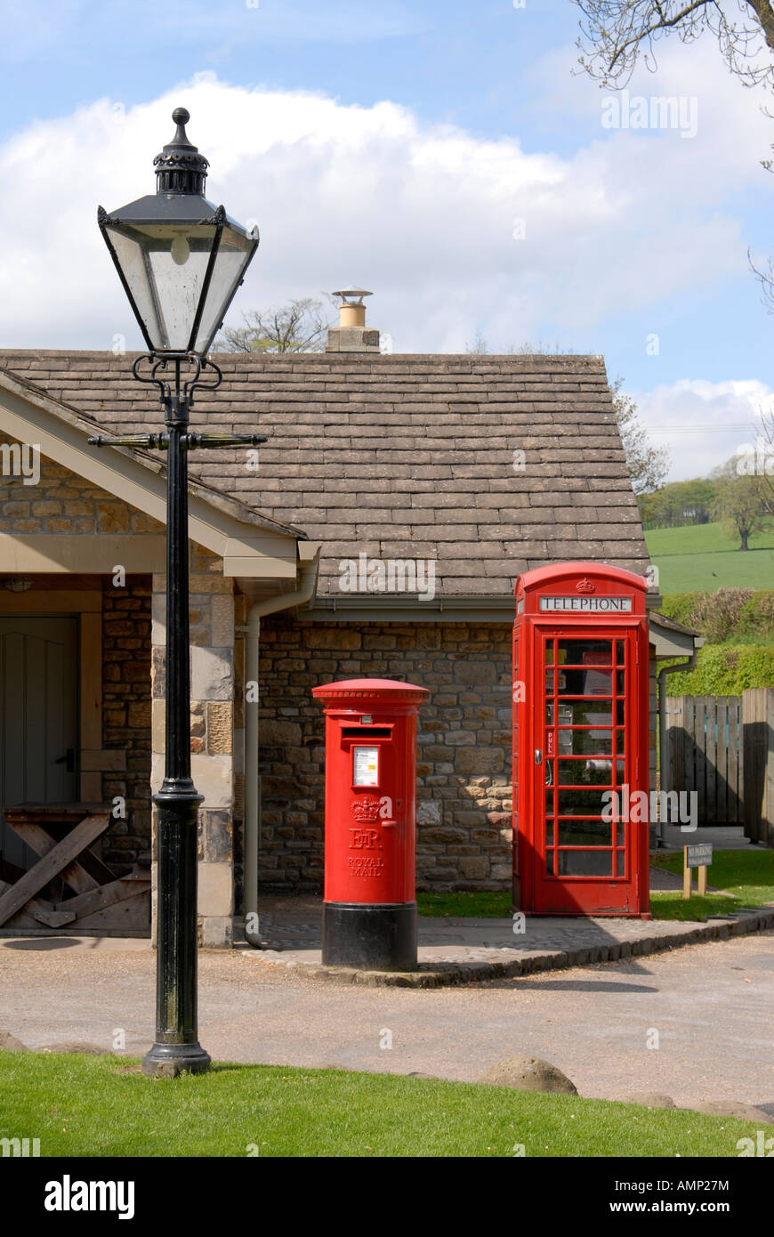 A red telephone box, post box and street light Stock Photo - Alamy