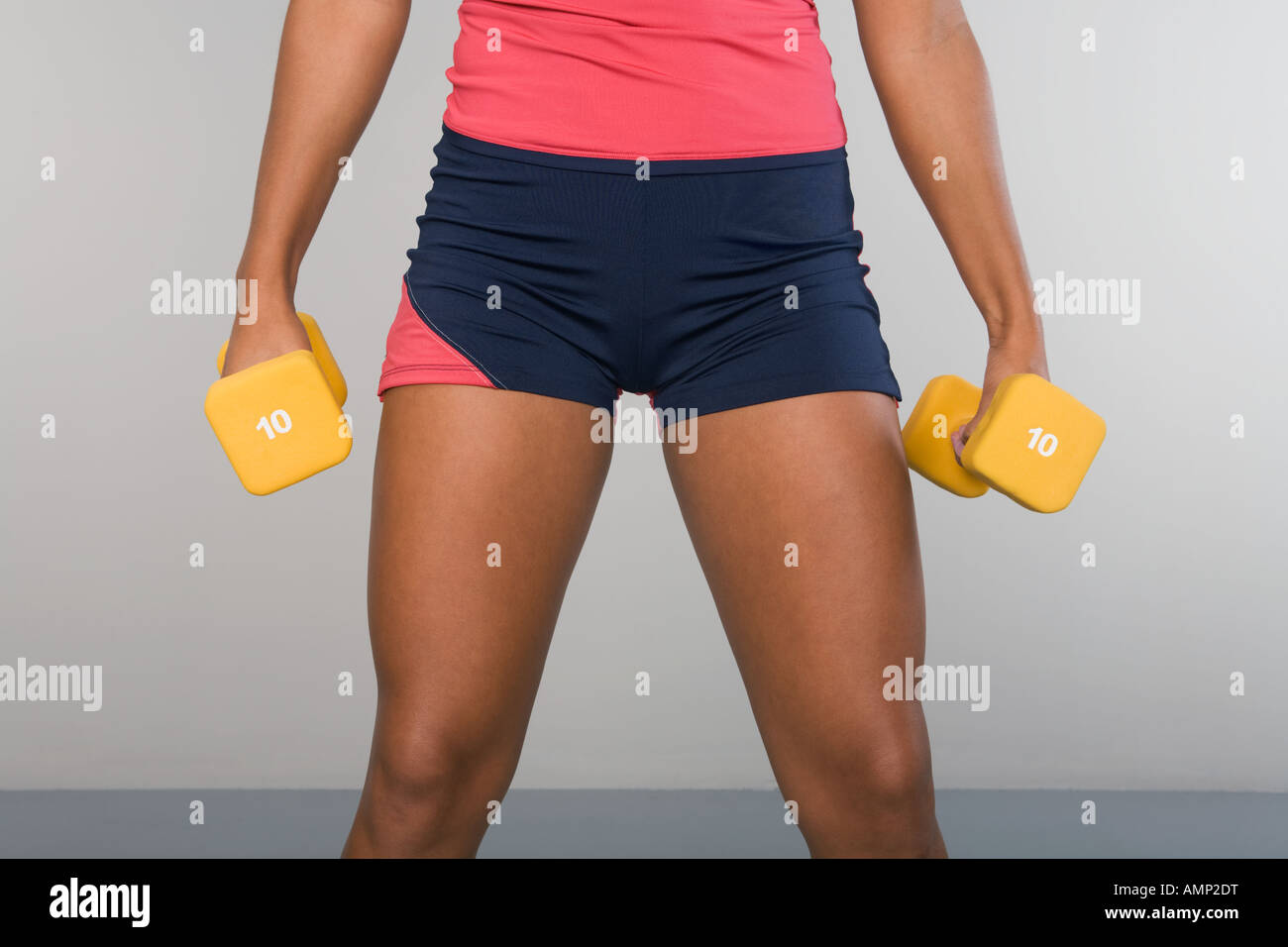 African woman exercising with weights Stock Photo - Alamy