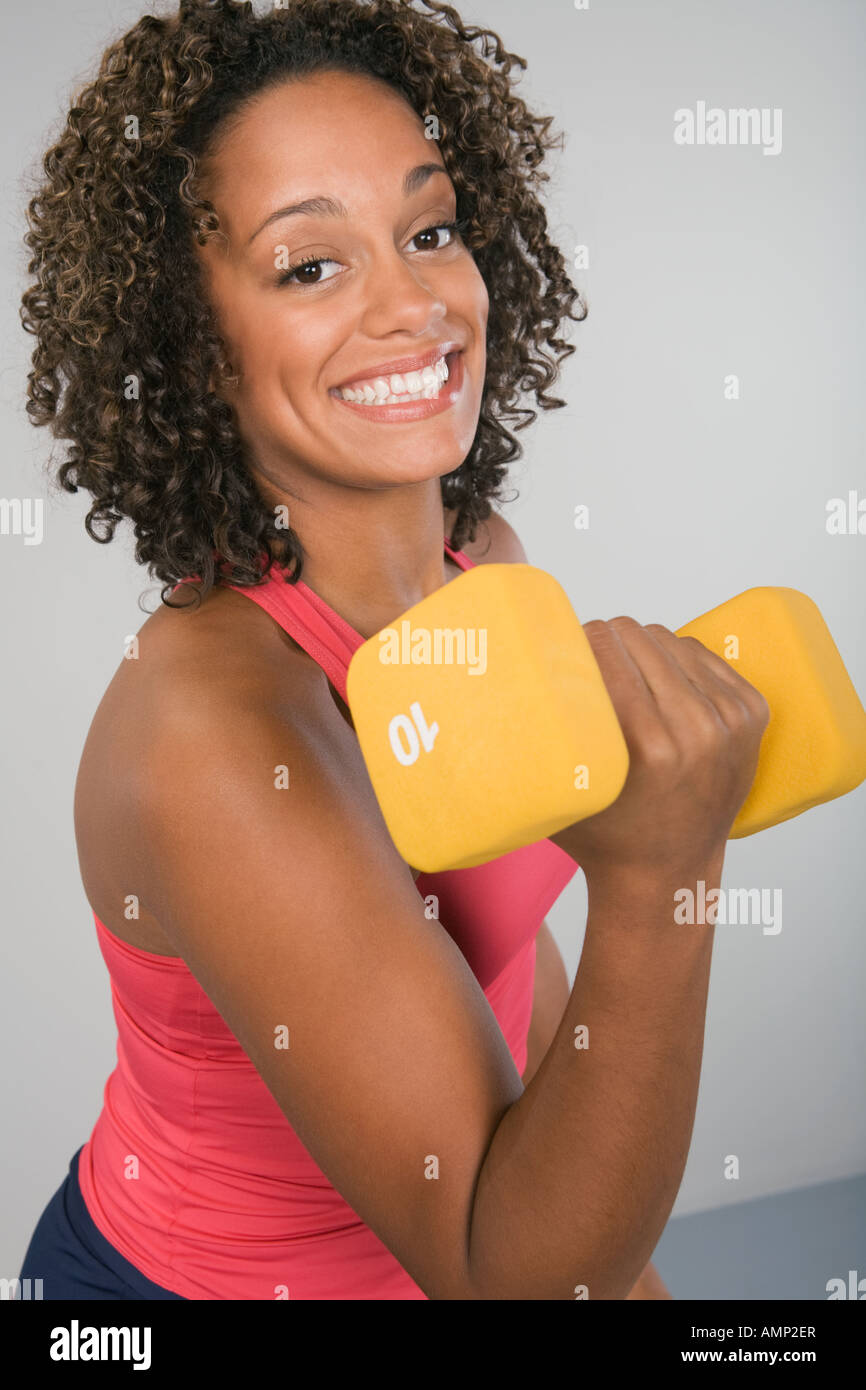 African woman exercising with weights Stock Photo - Alamy