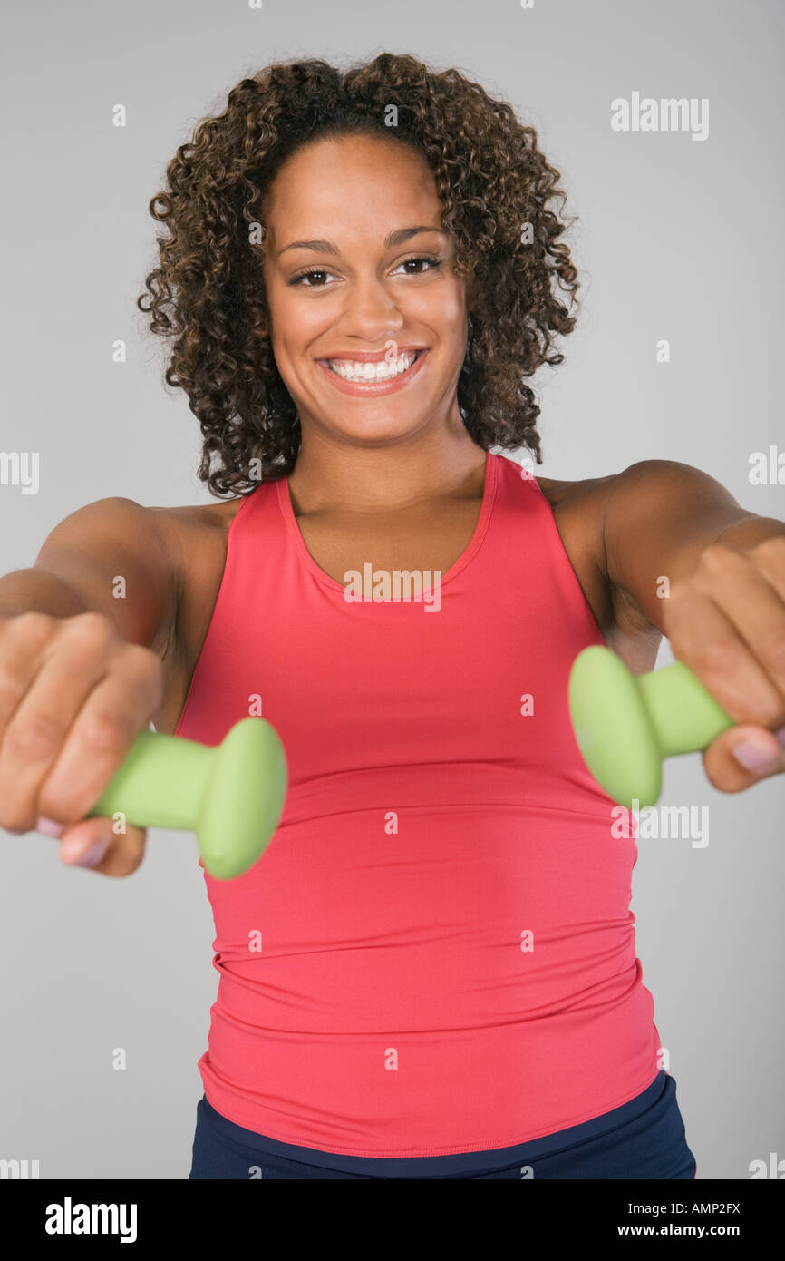 African woman exercising with weights Stock Photo - Alamy
