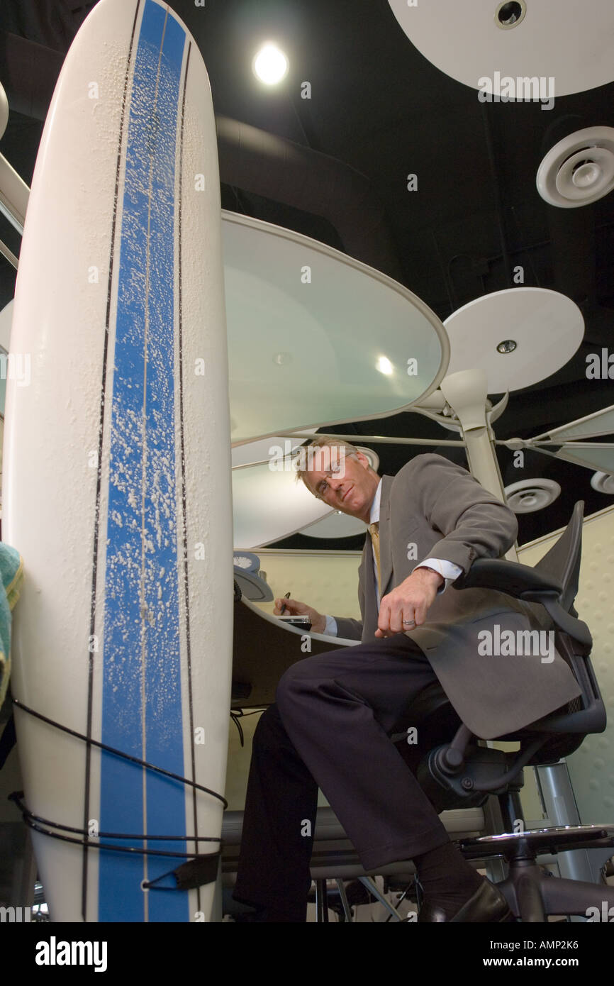 Adult businessman working surf board hi-res stock photography and ...