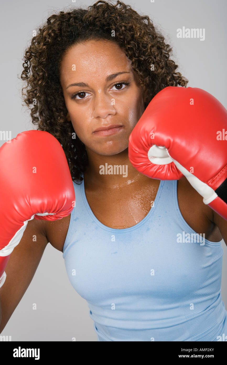 African woman wearing boxing gloves Stock Photo - Alamy