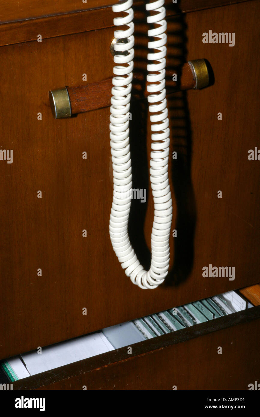In the office telephone cord Stock Photo - Alamy