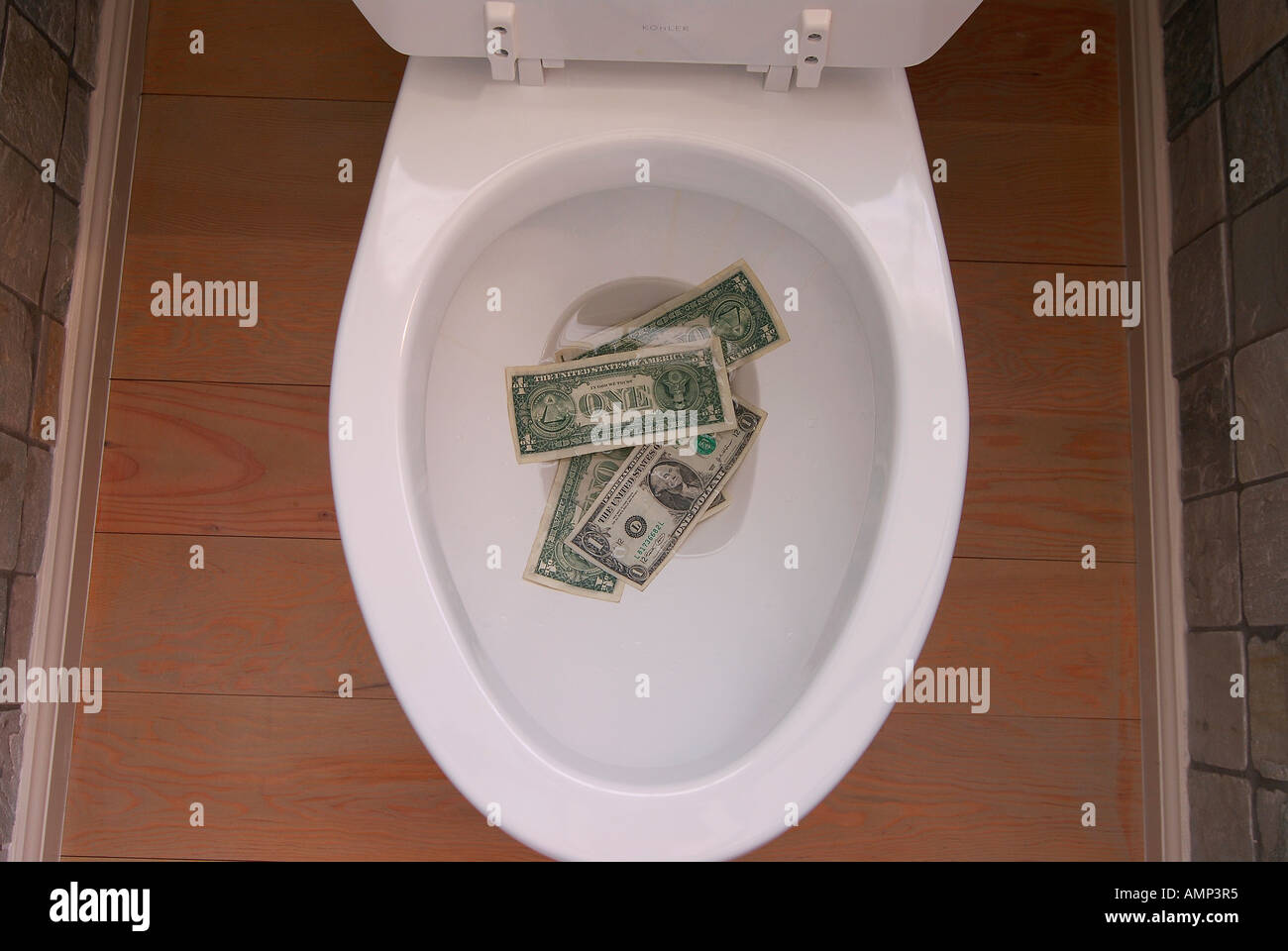 Money down the toilet hi-res stock photography and images - Alamy