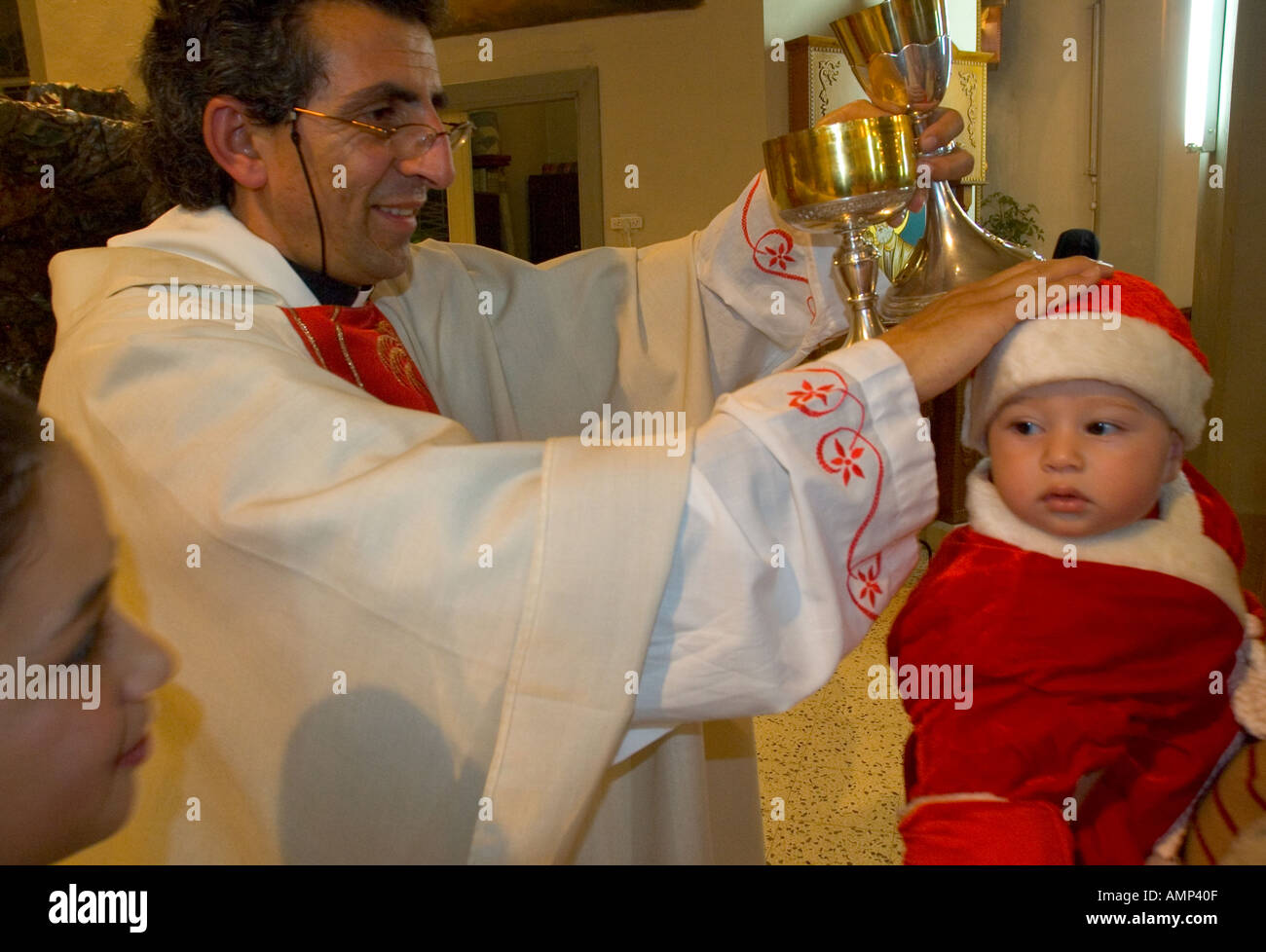 Benediction baby hi-res stock photography and images - Alamy