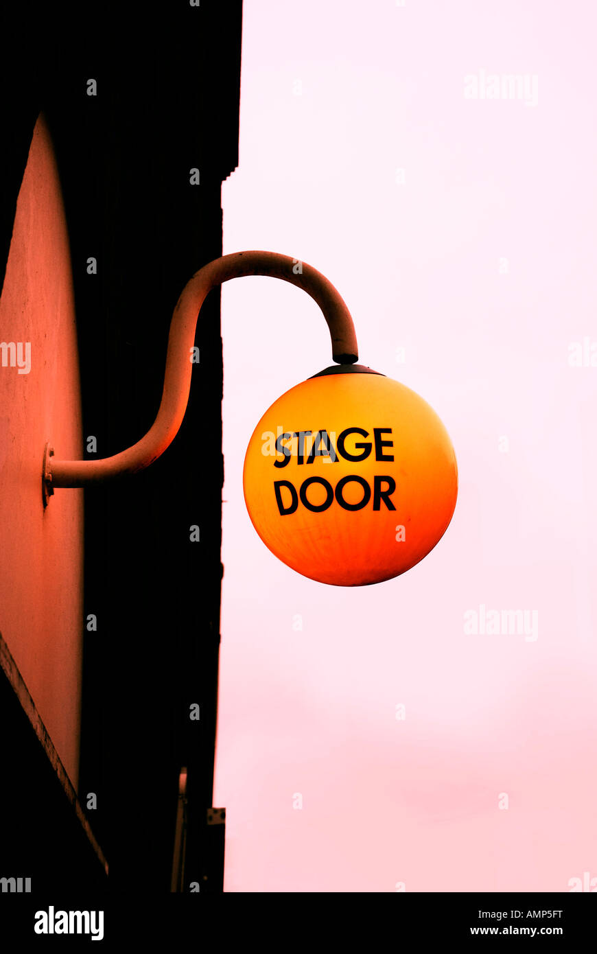 Stage door sign hanging out from building Stock Photo - Alamy