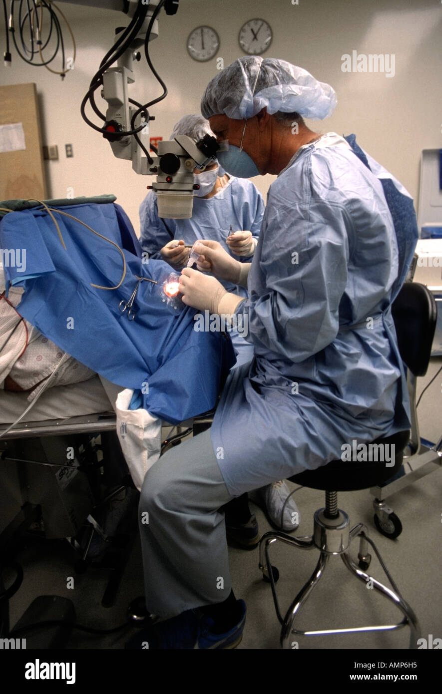 A doctor and nurse perform eye surgery Stock Photo - Alamy