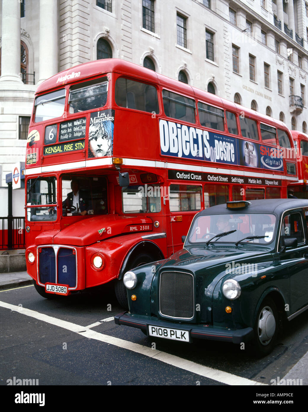 Routemaster buses and a black cab in London Stock Photo - Alamy