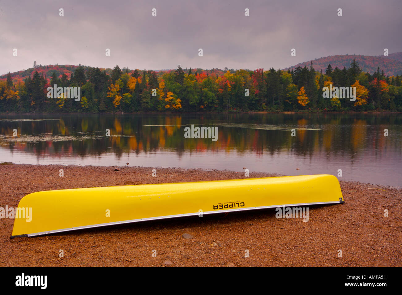 Canoe on the shore of Lac Monroe during fall in Parc national du Mont ...