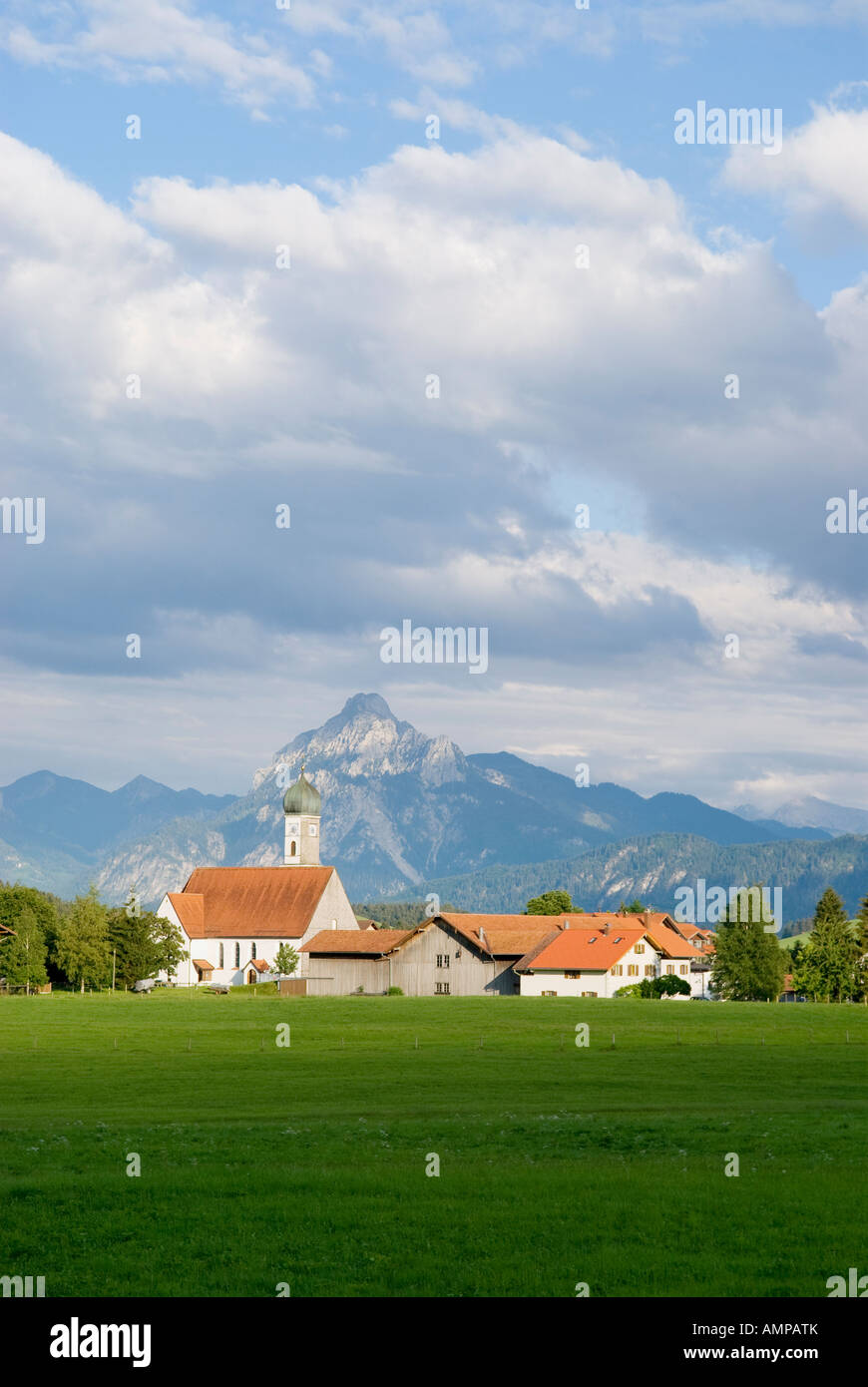 view across farm field to the small Bavarian village of Speiden with ...