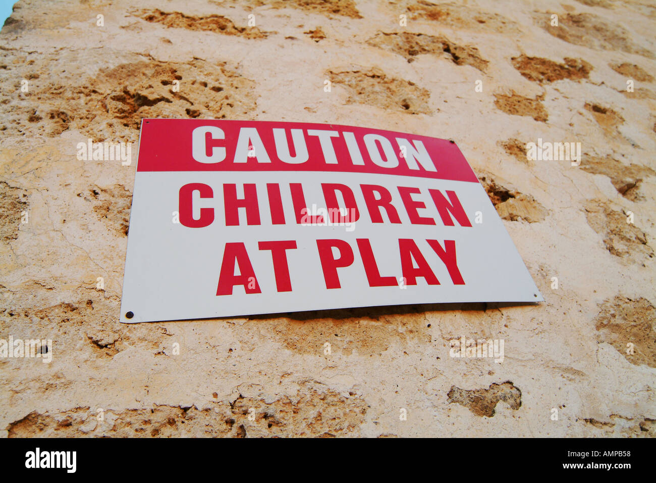 Sign saying Caution Children at Play Stock Photo - Alamy