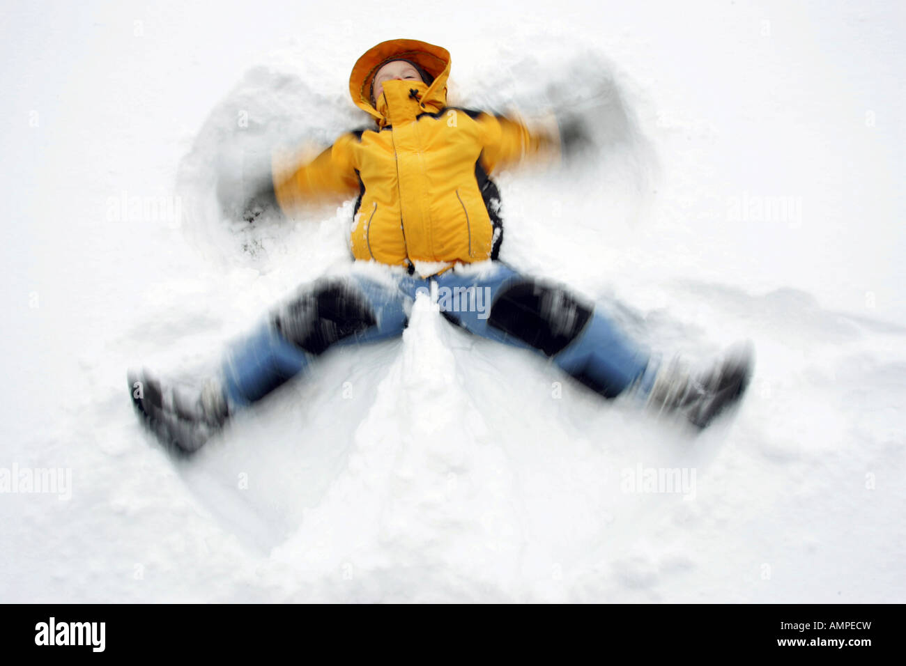 Kid snow angel hi-res stock photography and images - Alamy