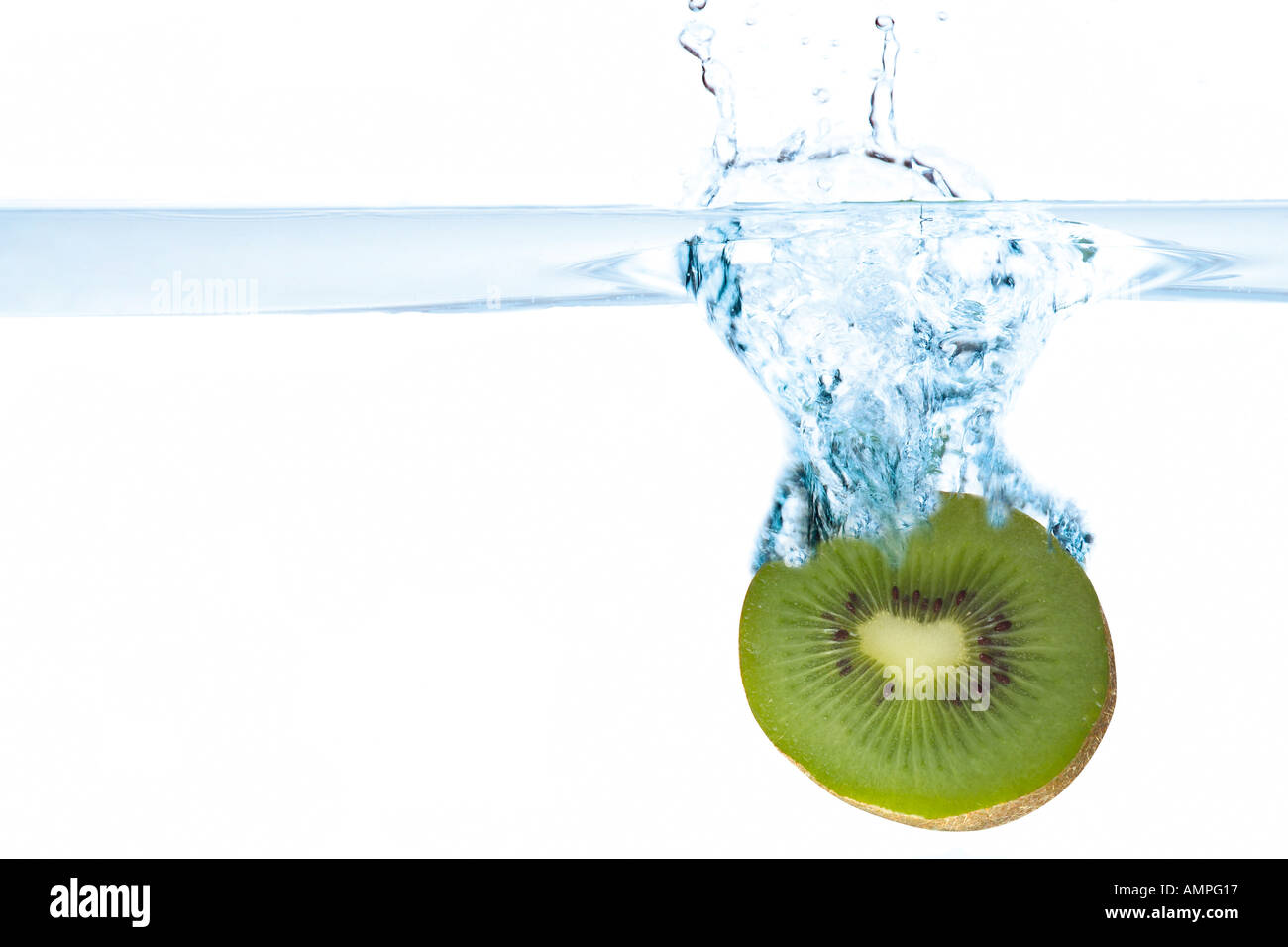Kiwi splashing into water Stock Photo - Alamy