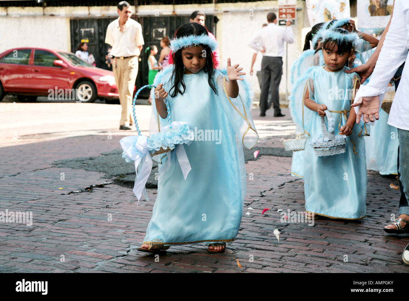 Young girls dressed as angels during a religious parade procession at ...