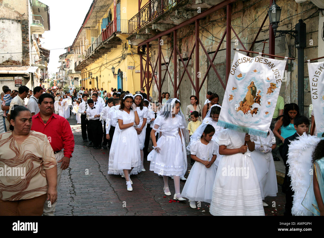 Young girls dressed during a religious parade procession at San Felipe ...