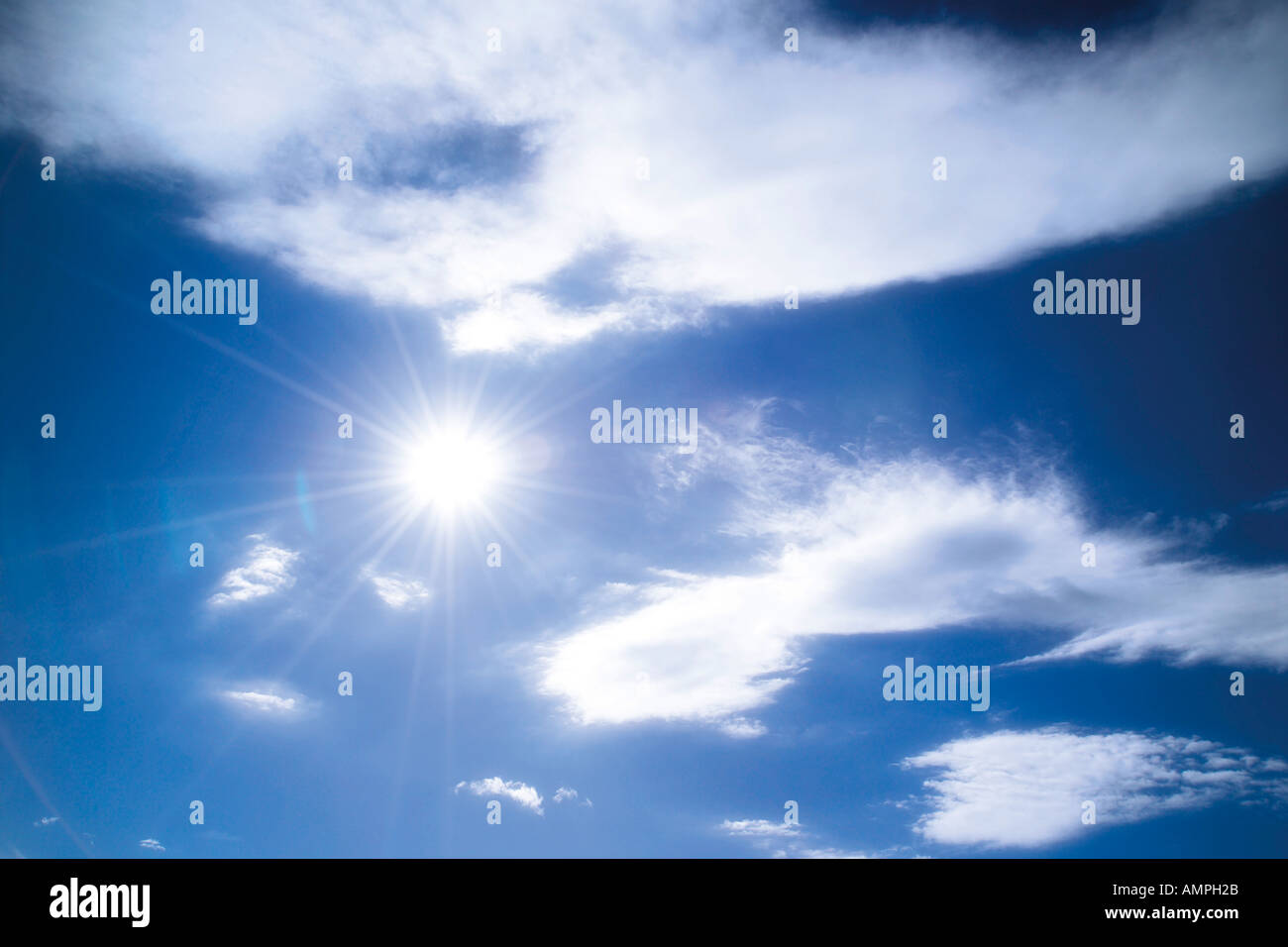 Sun shining through clouds atmospheric mood hi-res stock photography ...