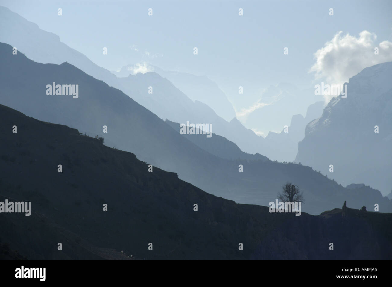 Several misty mountain ranges after another near Manang Annapurna ...