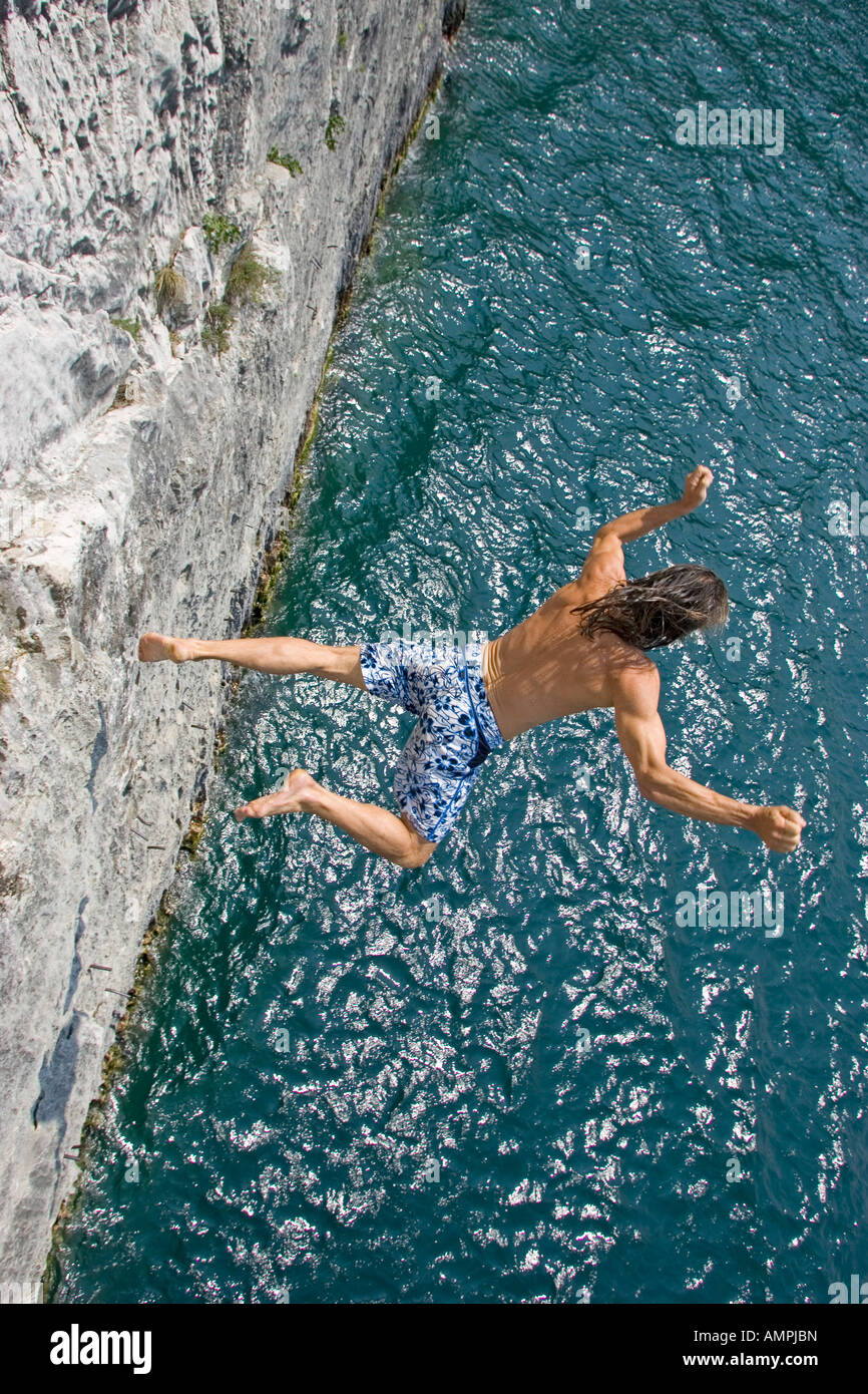 jumping into the water Stock Photo - Alamy