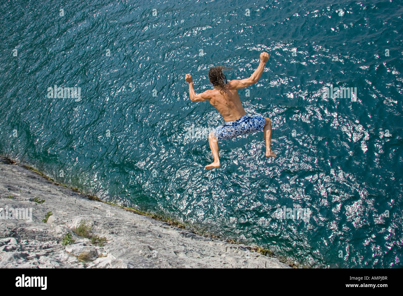 jumping into the water Stock Photo - Alamy
