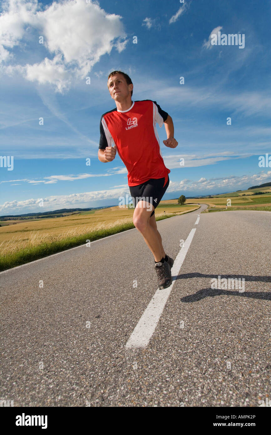 jogger running on street Stock Photo - Alamy