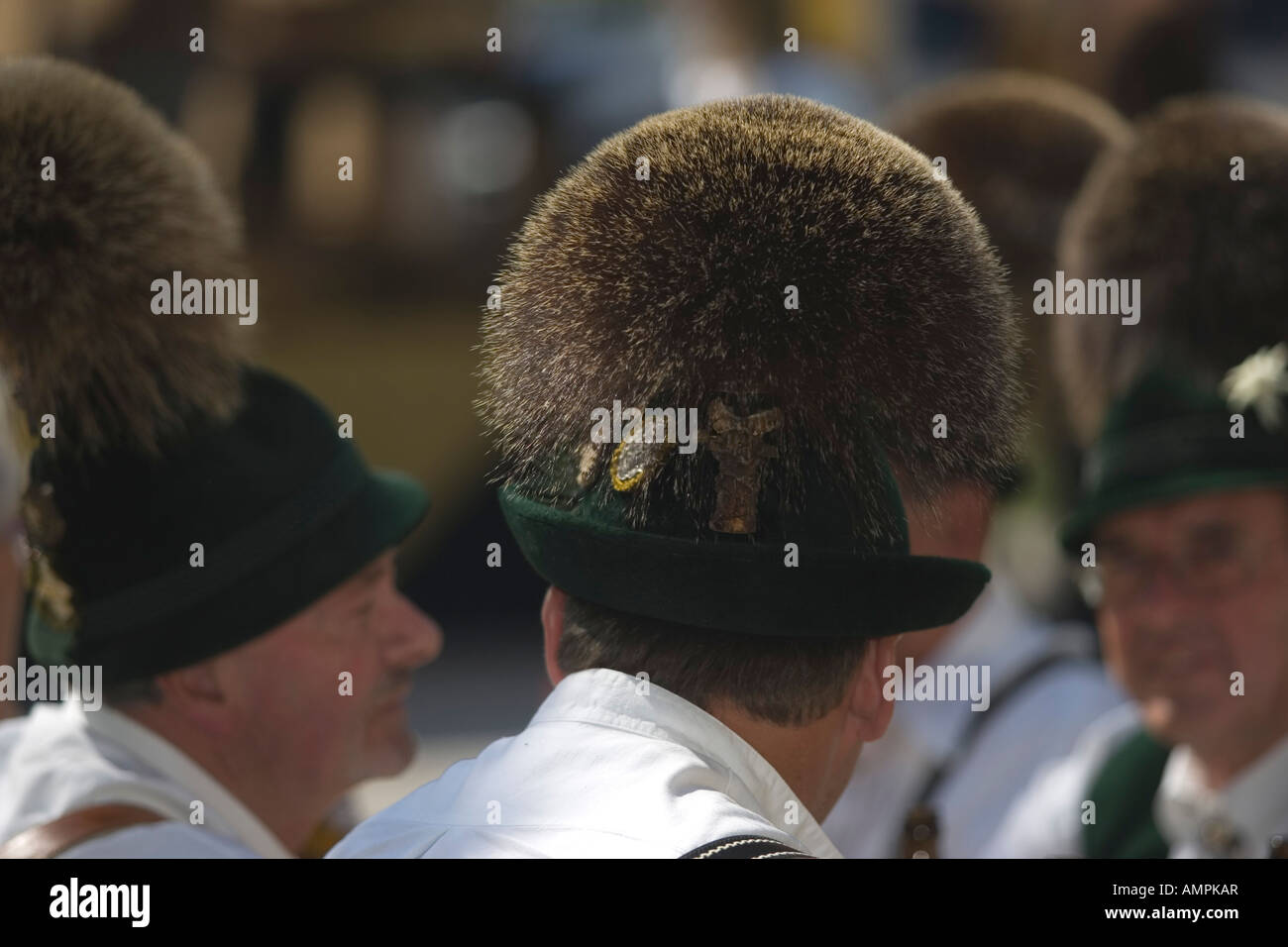men wearing hat tuft of hair traditionally worn as a decoration Stock ...