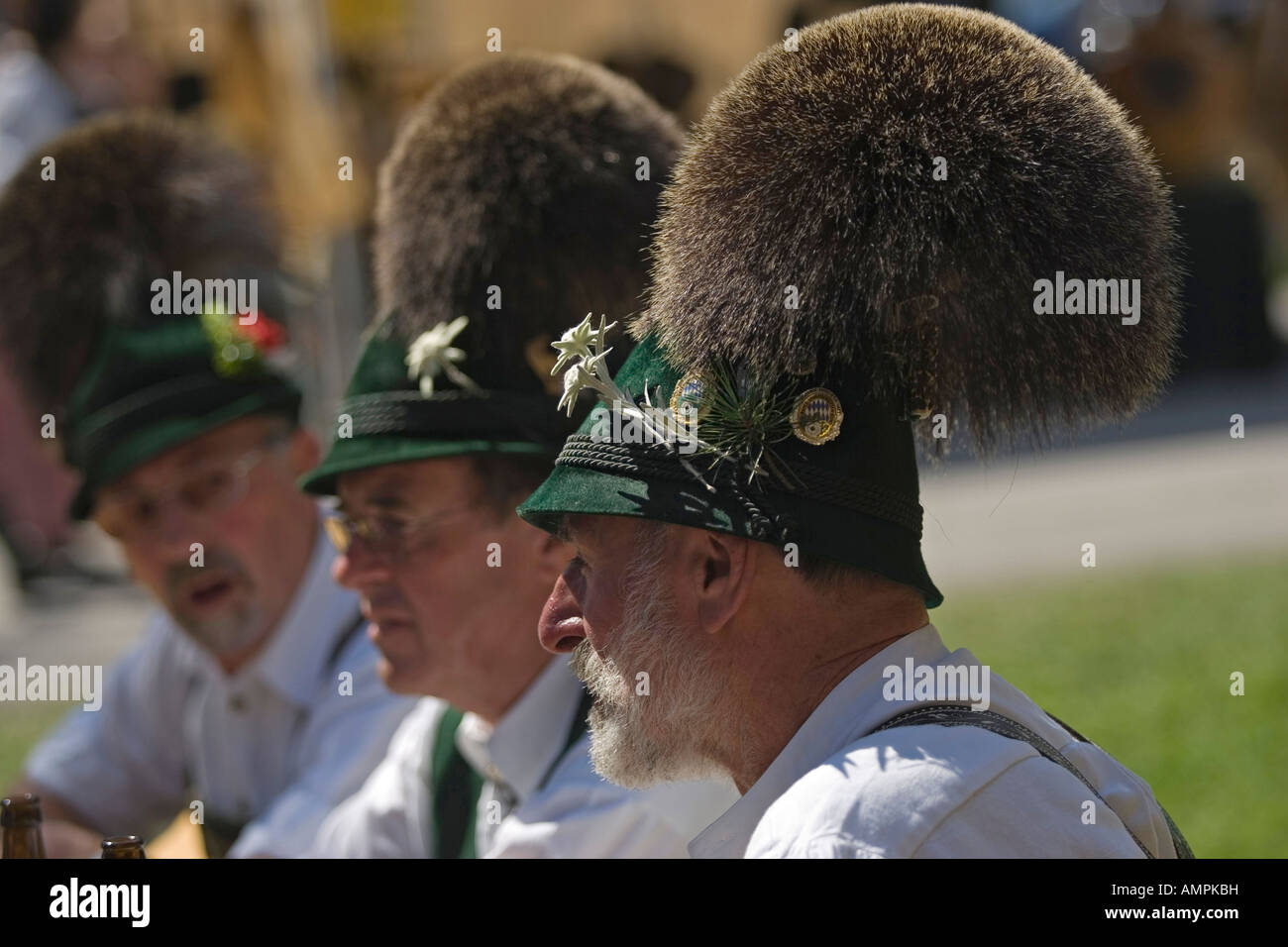 men wearing hat tuft of hair traditionally worn as a decoration Stock ...