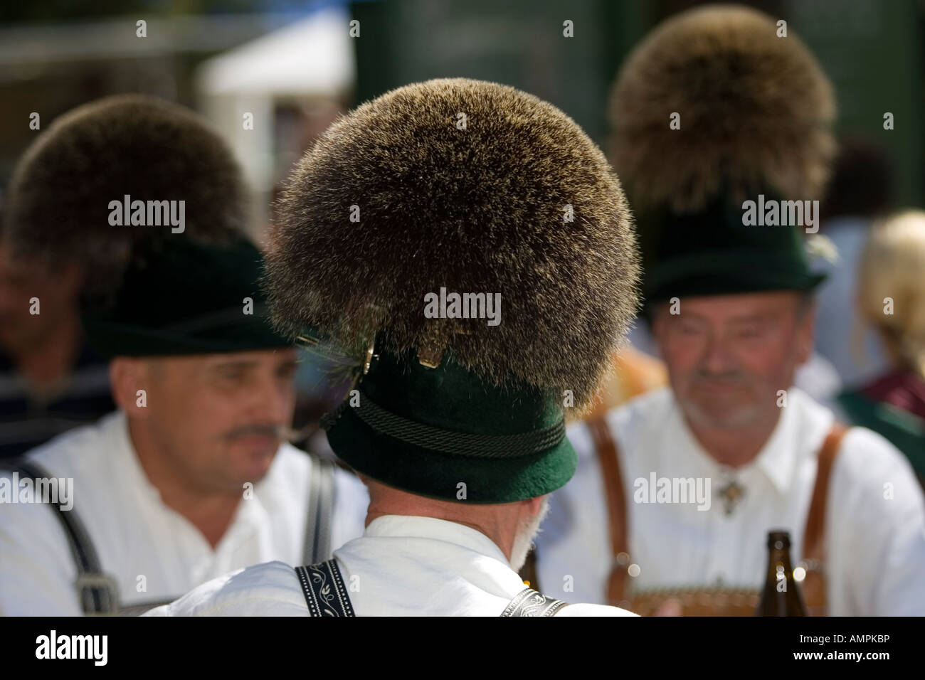 men wearing hat tuft of hair traditionally worn as a decoration Stock ...