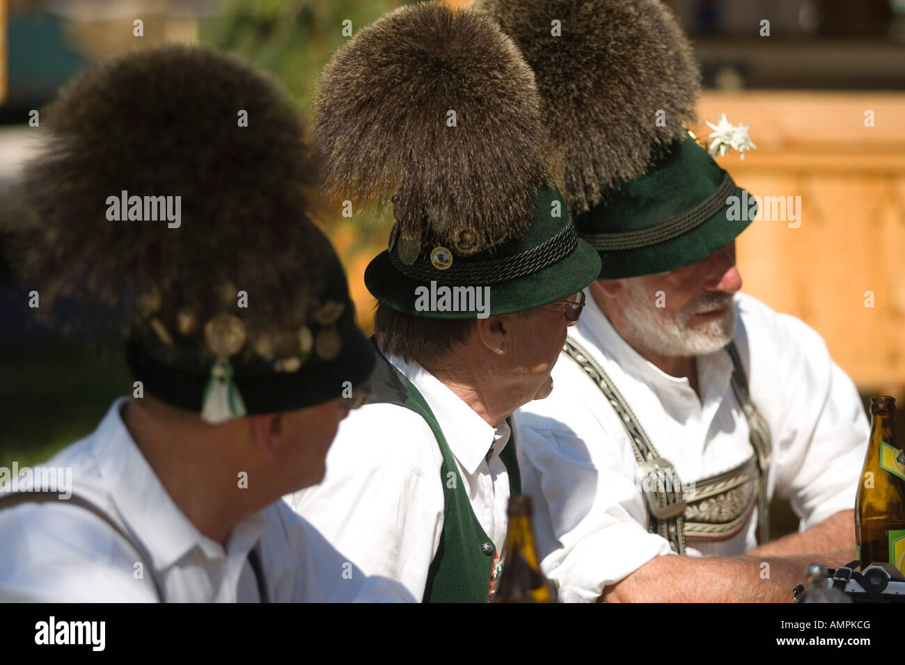 men wearing hat tuft of hair traditionally worn as a decoration Stock ...