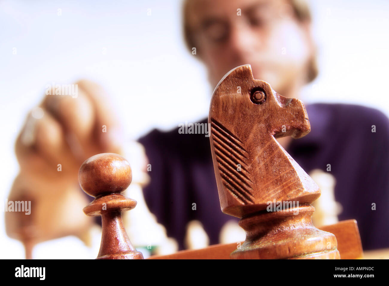 Man playing chess Stock Photo - Alamy