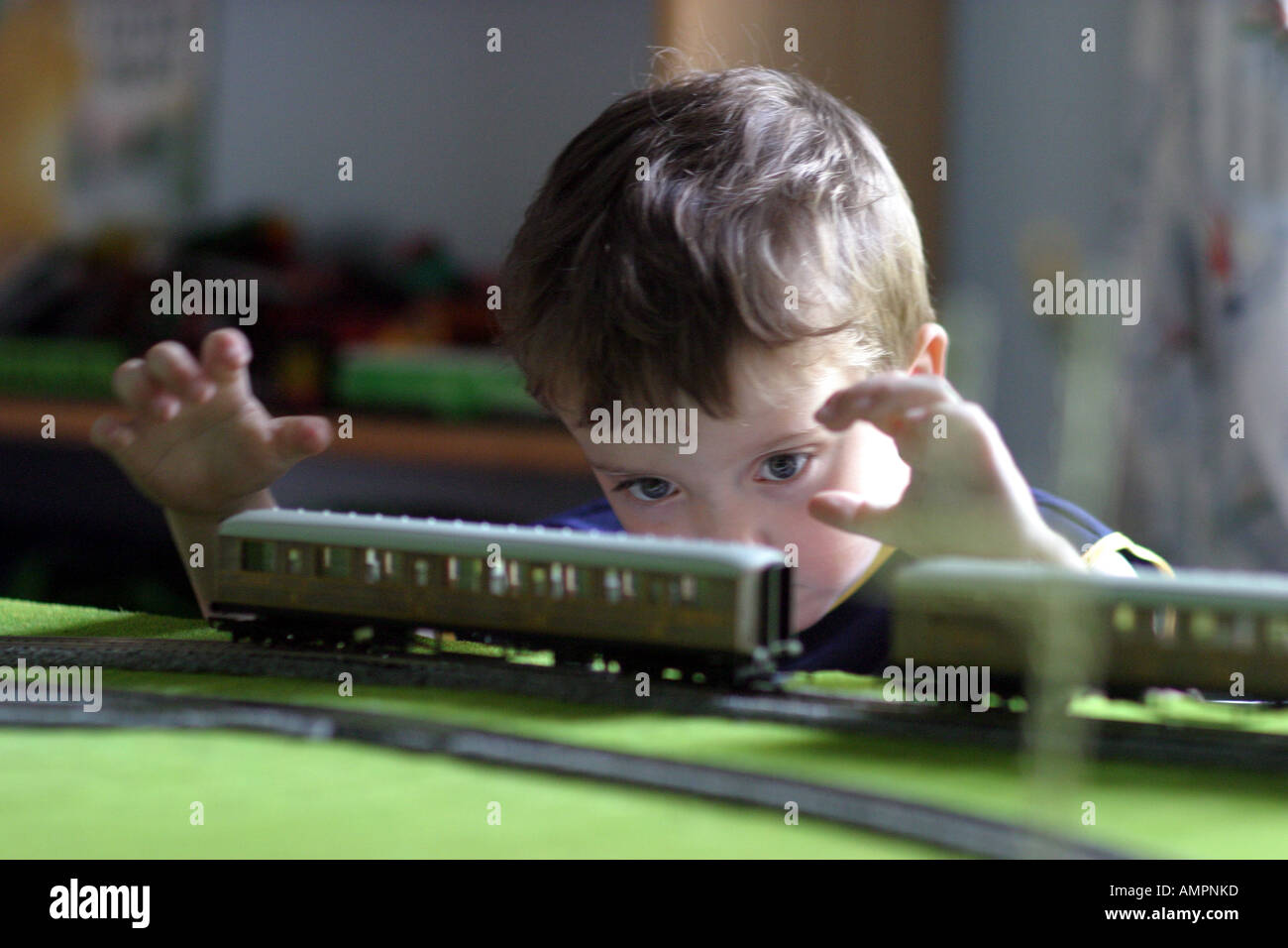 Train boy Lewis aged 5 and his train set Stock Photo - Alamy