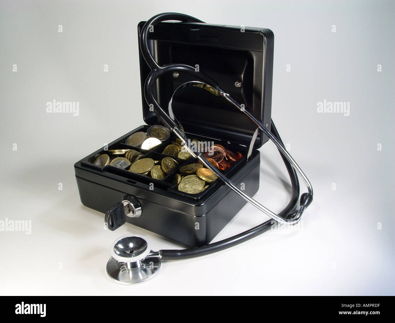 cash box with stethoscope Stock Photo - Alamy