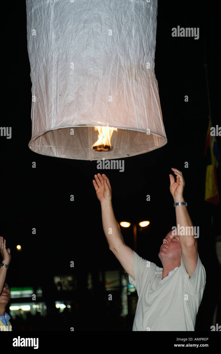 Thailand Loi Krathong Festival Tourist Launching Paper Lantern Into Sky ...