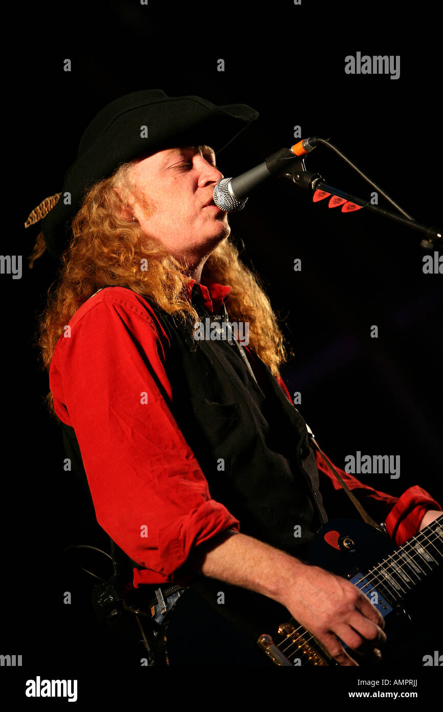 Singer and guitarist with the Levellers at Wychwood Festival 2007 Stock ...