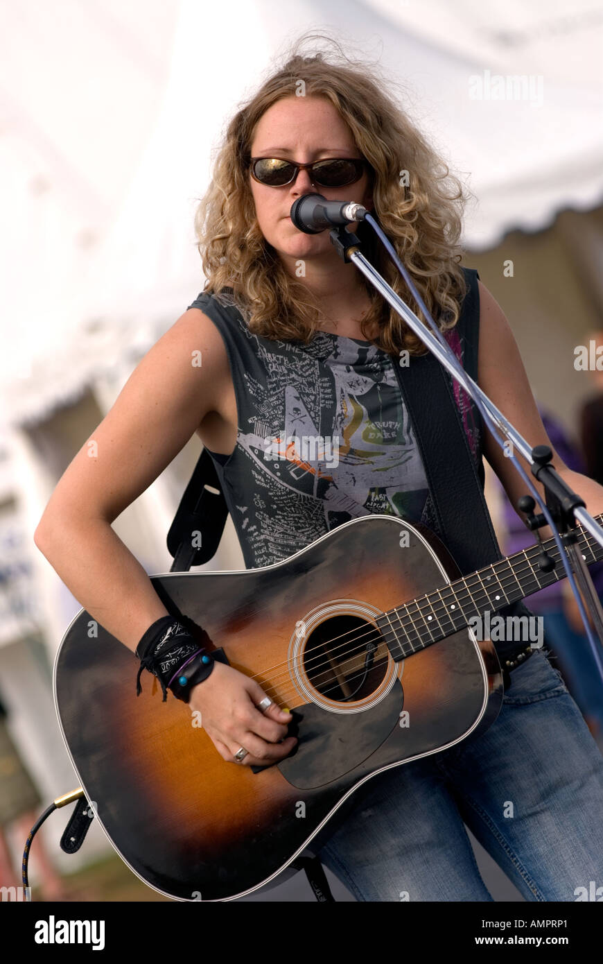 Singer and guitarist performing at Hampton Court Show 2006 Stock Photo ...