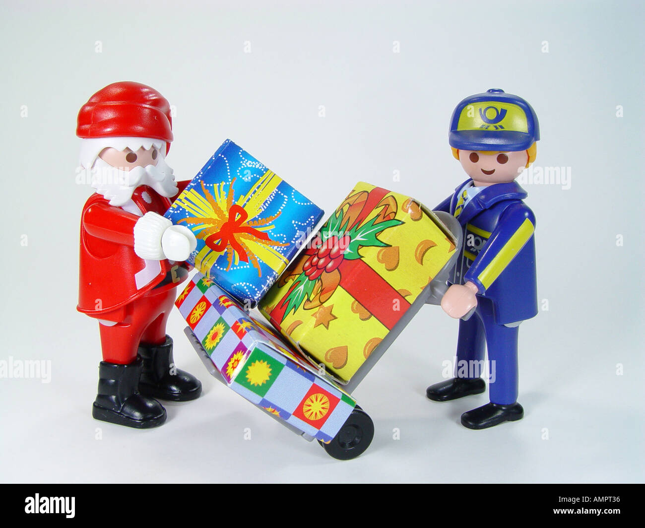 postman with christmas gifts Stock Photo - Alamy