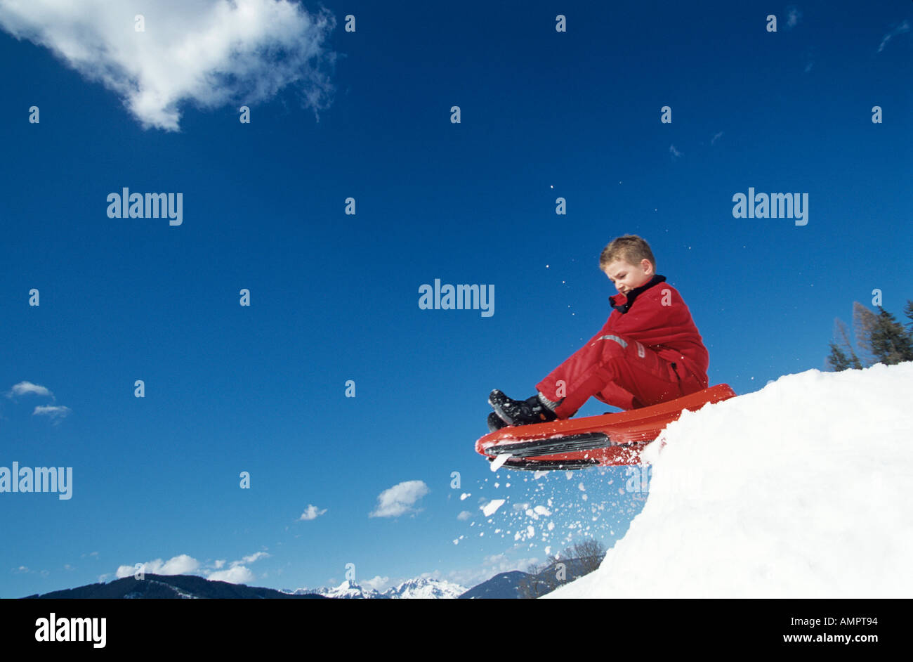 Boys on sledges hi-res stock photography and images - Alamy