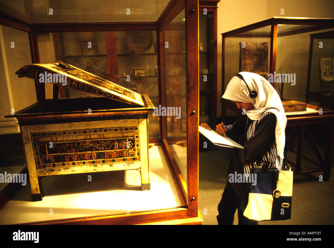 Cairo Museum student sketching ancient relic Stock Photo - Alamy