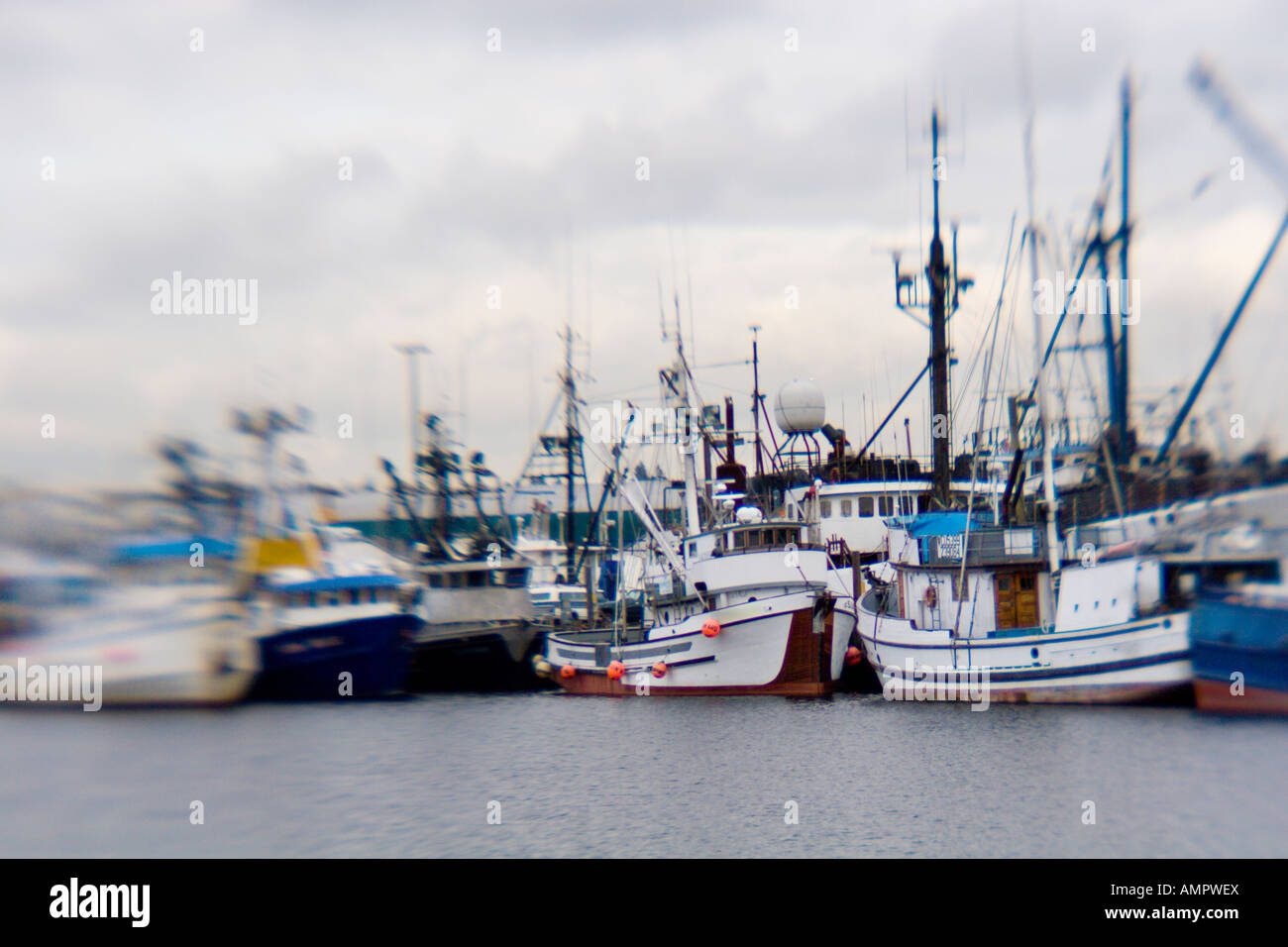 selective focus image of commercial fishing boats at fishermans wharf ...