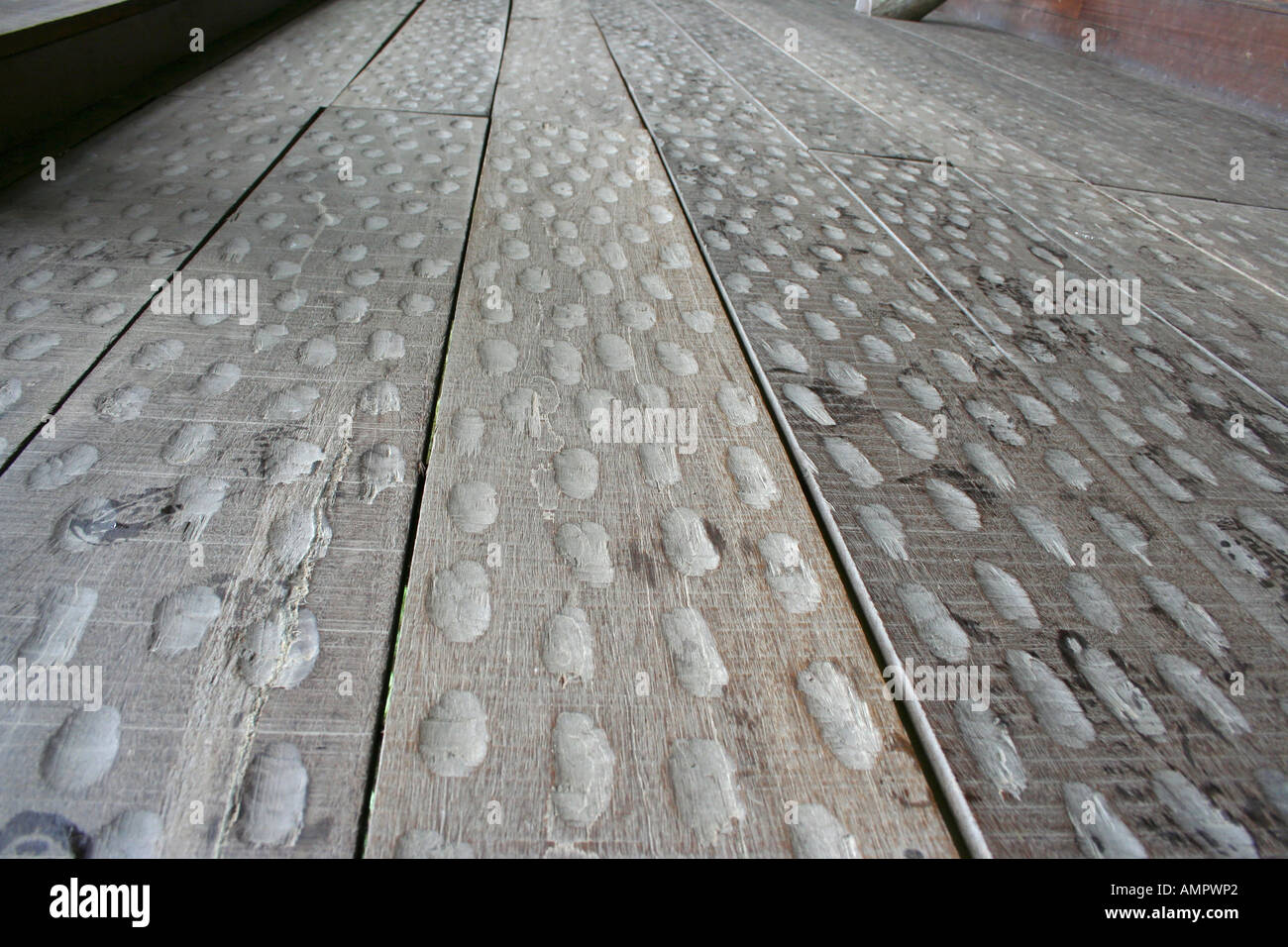 Indented floor of native home in Sarawak, Malaysia, to prevent slipping ...