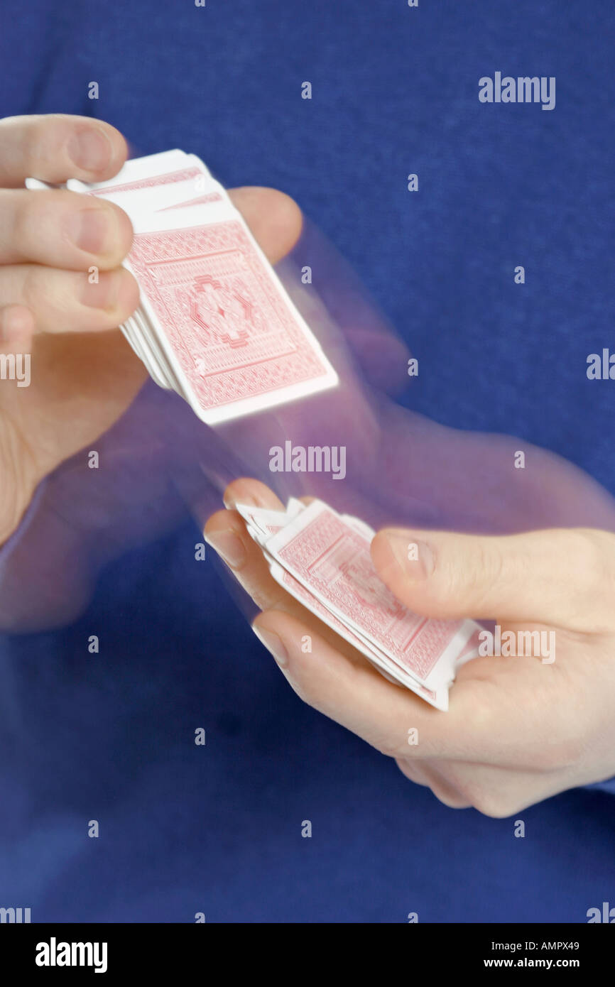 Person shuffling cards, close up Stock Photo - Alamy