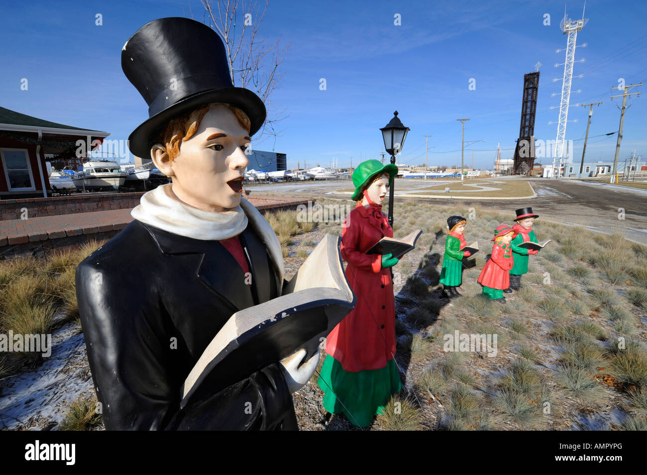 Statues of family caroling Christmas theme for the Xmas holiday season ...