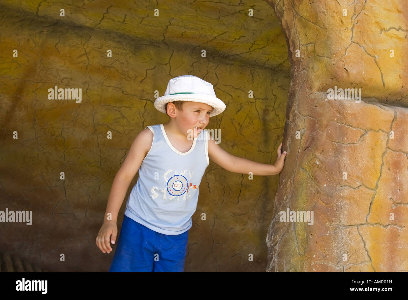kid play in cave on playground Stock Photo - Alamy
