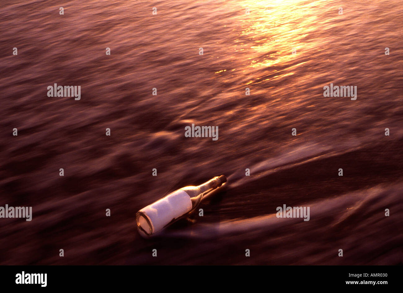 Message in a bottle on the beach Stock Photo - Alamy