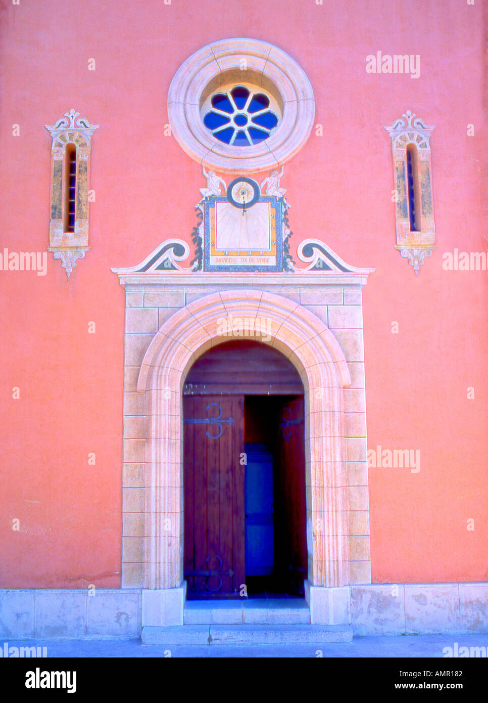 Colorful Pink Church in the town of La Mole in the region of Provence ...
